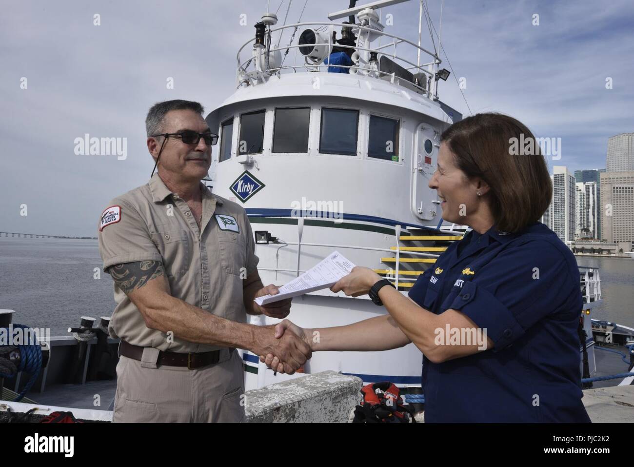 Capt. Megan Dean, commander of Coast Guard Sector Miami, issues a ...