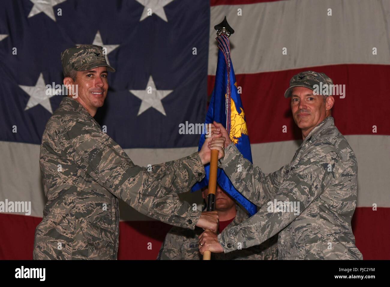 U.S. Air Force Col. Derek O’Malley, 20th Fighter Wing commander, left ...