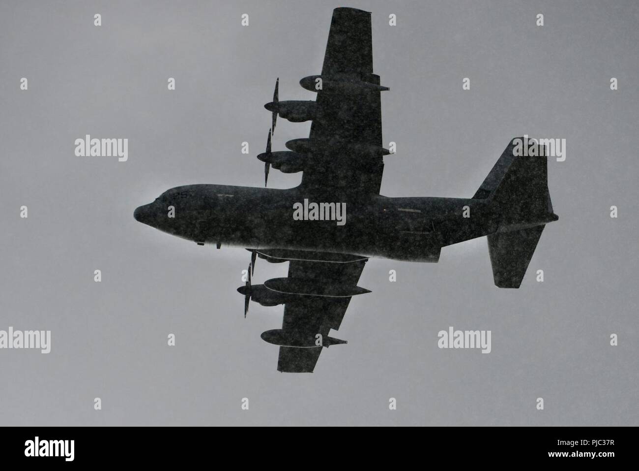 Hercules military transport plane flies hi-res stock photography and ...