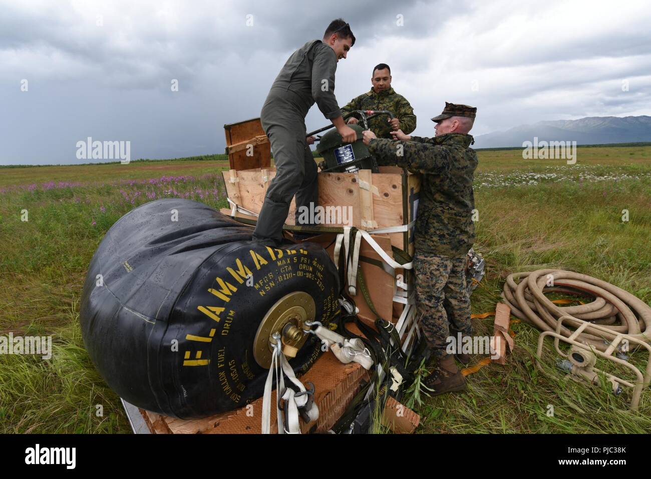 U.S. Marine Corps Lt. Col. Matthew Mulvey (right) commander of the the ...