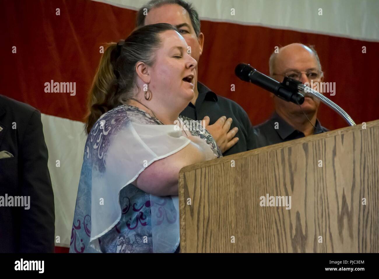 Michelle Long sings the National Anthem during the groundbreaking ...