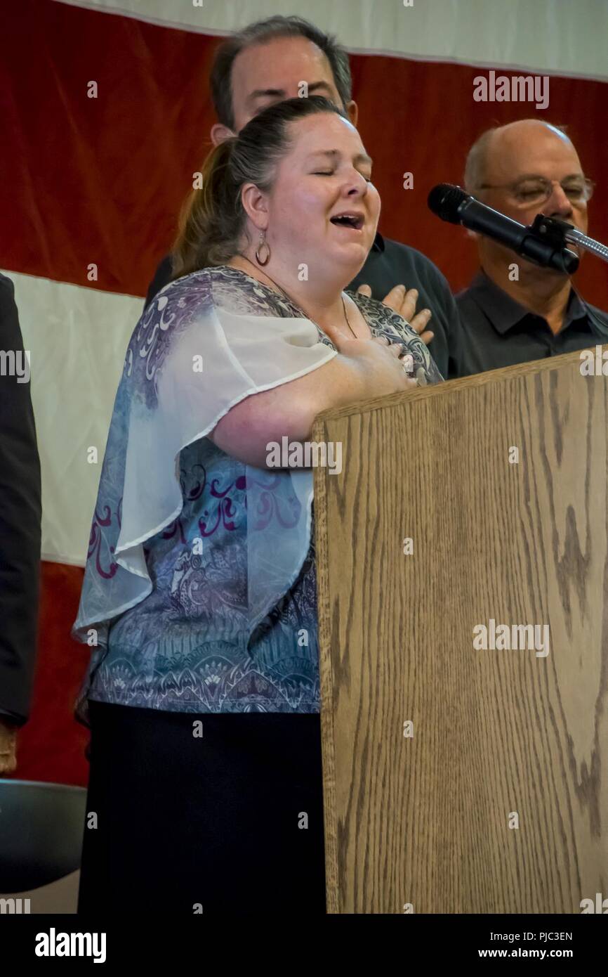 Michelle Long sings the National Anthem during the groundbreaking ...