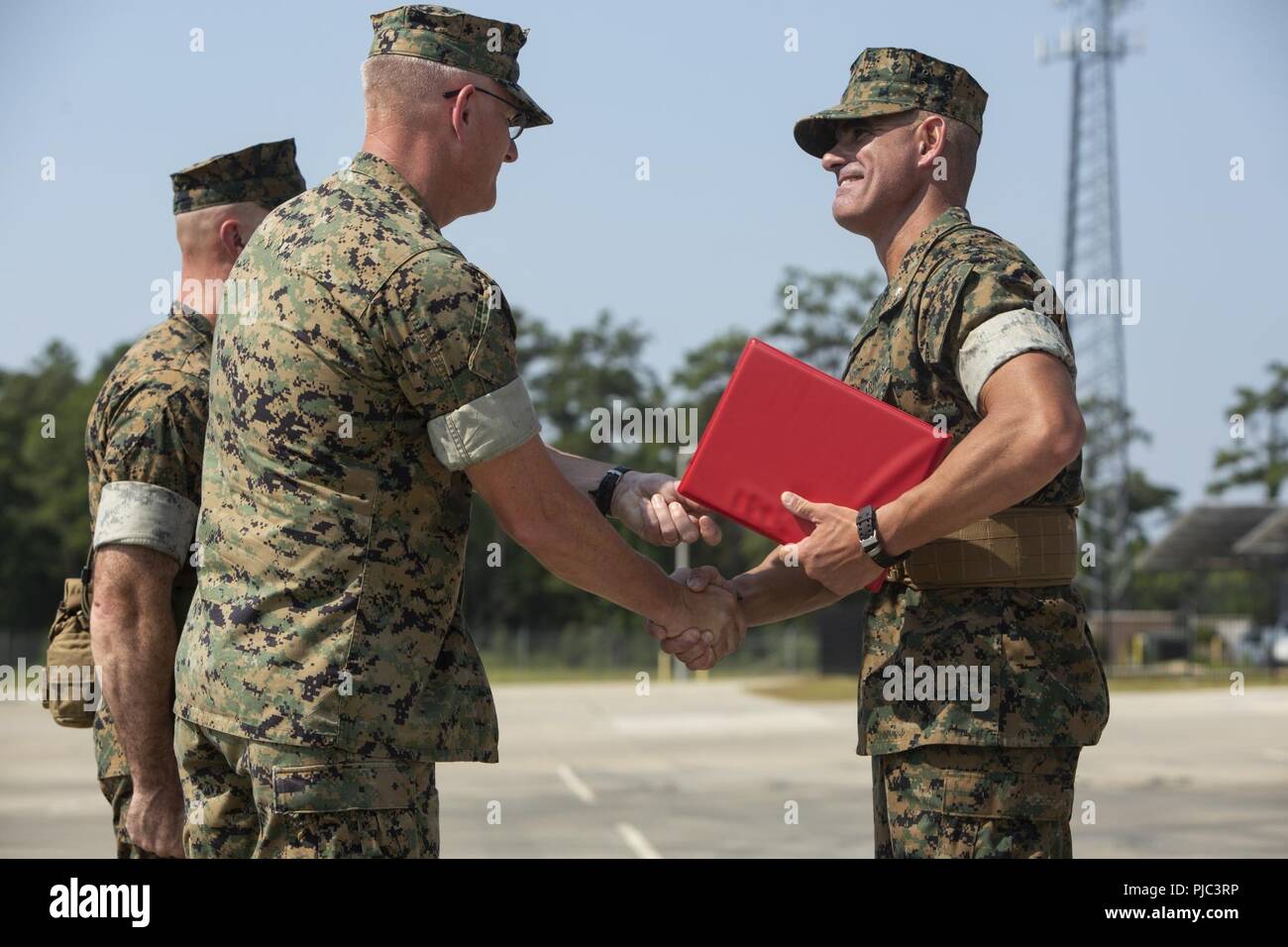 U.S. Marine Lt. Col. Scott Zimmerman, the outgoing commanding officer ...