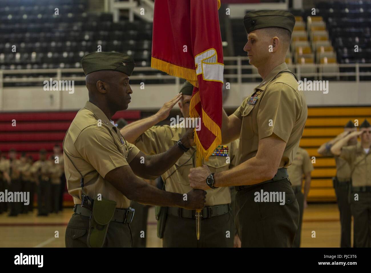 U.S. Marine Corps Col. Samuel C. Cook, right, the outgoing commanding ...