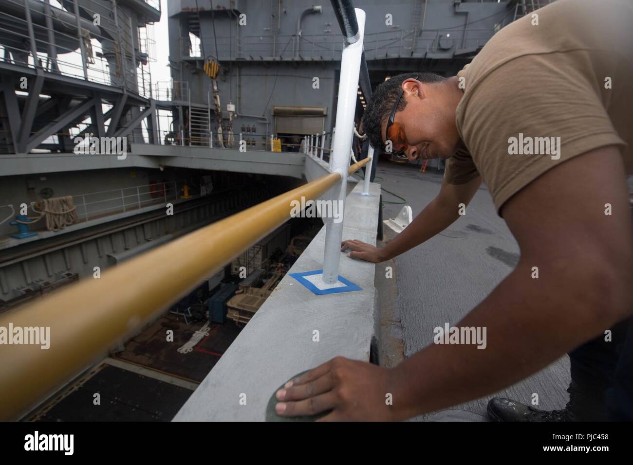 CARIBBEAN SEA (July 9, 2018) Seaman Tristen Hernandez conducts topside ...