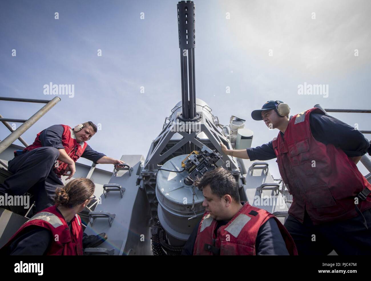 PACIFIC OCEAN (July 12, 2018) Sailors perform maintenance on a Phalanx ...