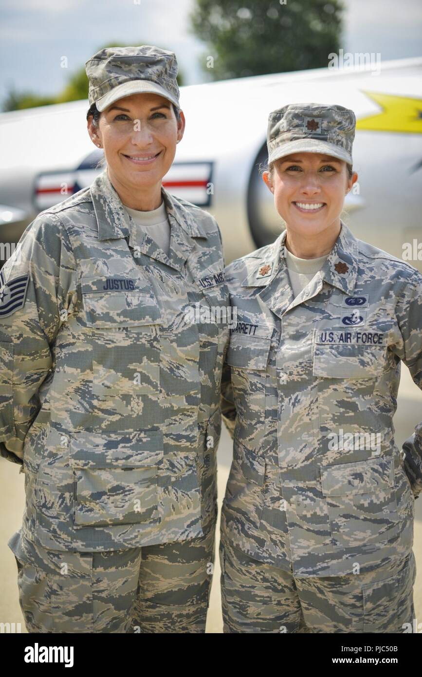 Major Tarren Barrett and Tech. Sgt. Stephanie Justus pose for the ...