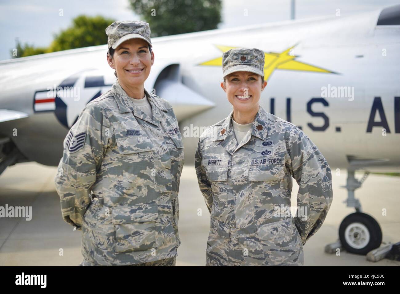 Major Tarren Barrett and Tech. Sgt. Stephanie Justus pose for the ...
