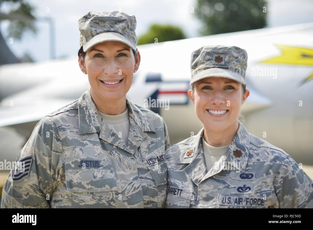 Major Tarren Barrett and Tech. Sgt. Stephanie Justus pose for the MEO ...