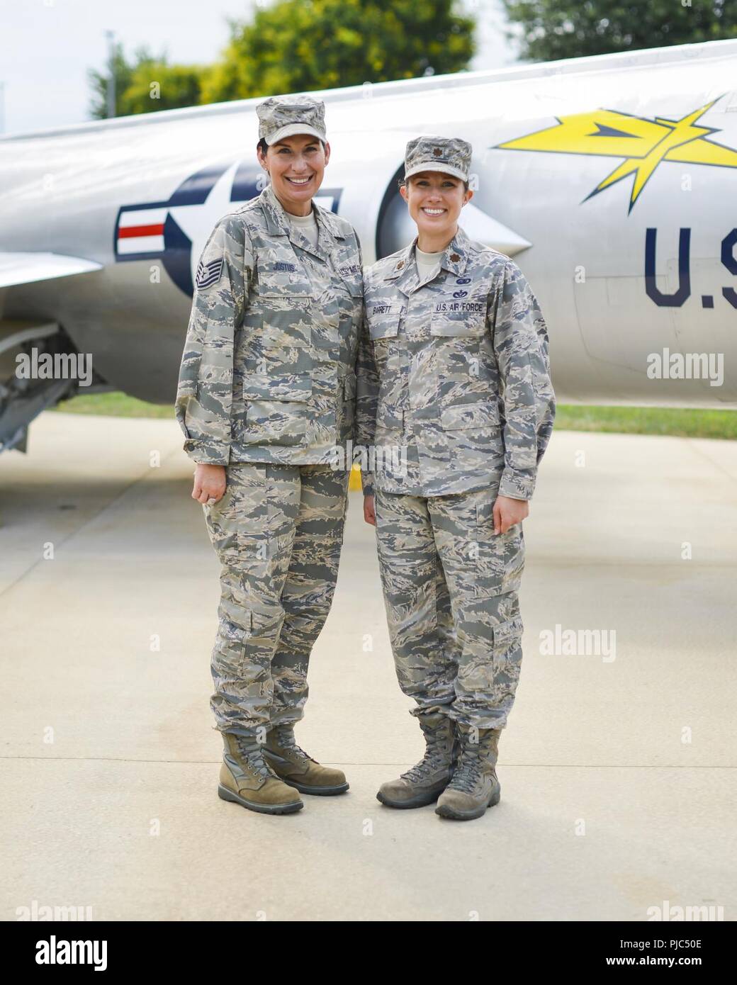 Major Tarren Barrett and Tech. Sgt. Stephanie Justus pose for the ...