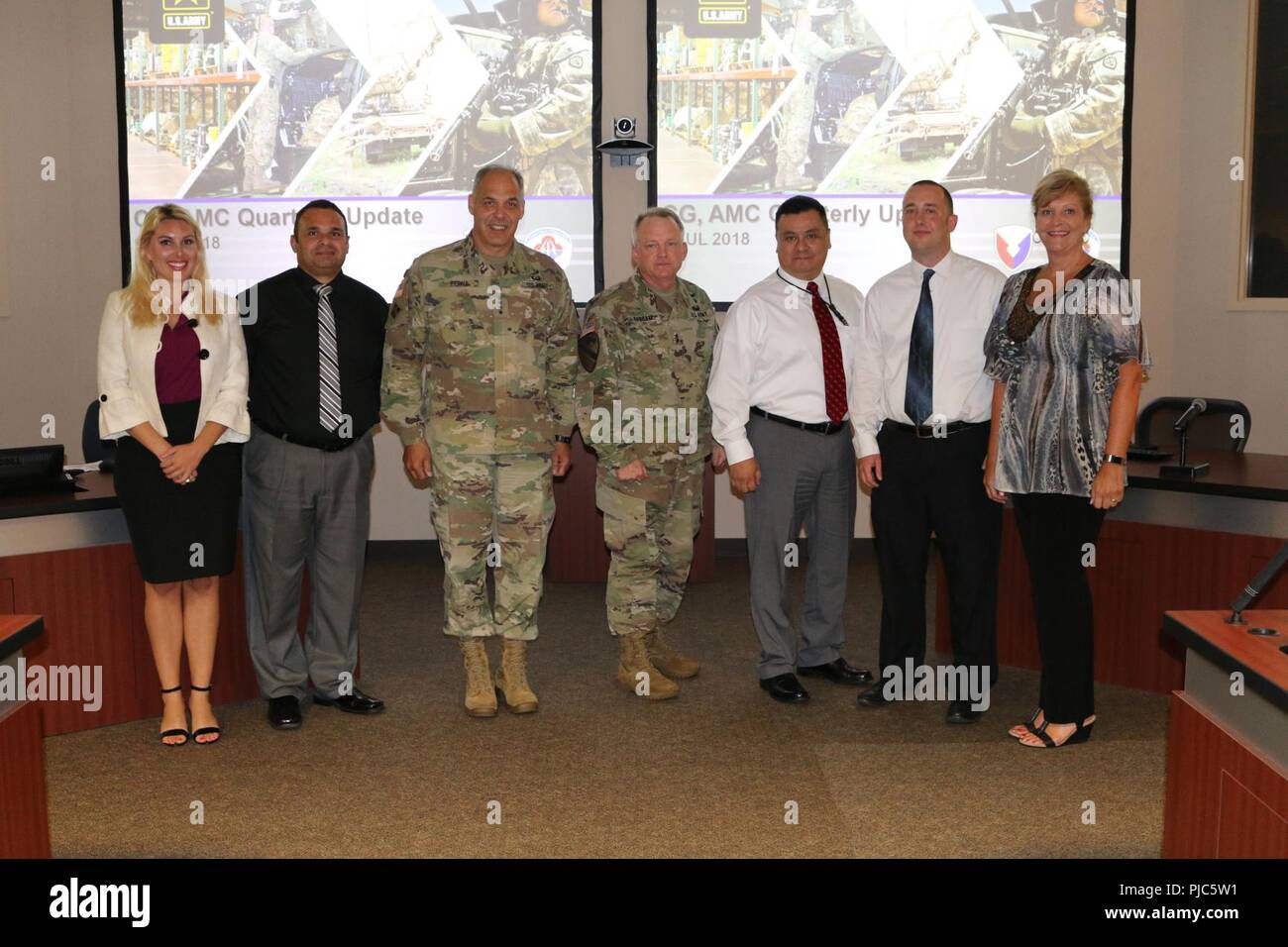 Five AMCOM employees were honored by Gen. Gus Perna for their ...