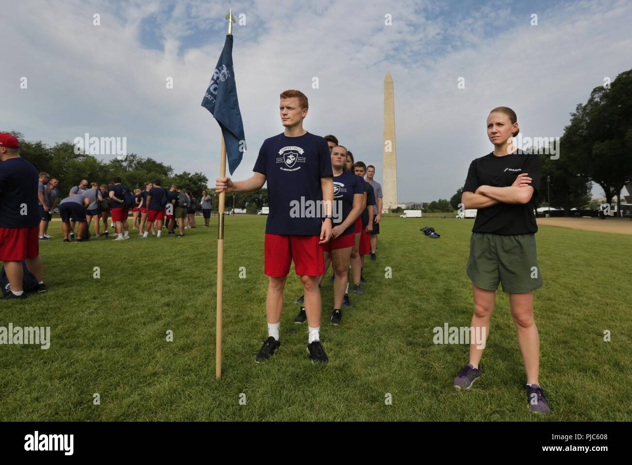 Marine Sgt. Sarah Steiert listens to the scavenger hunt brief after ...