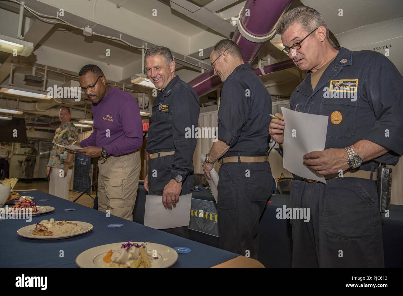 PACIFIC OCEAN (July 14, 2018) Leaders of Carrier Strike Group 1 and USS ...