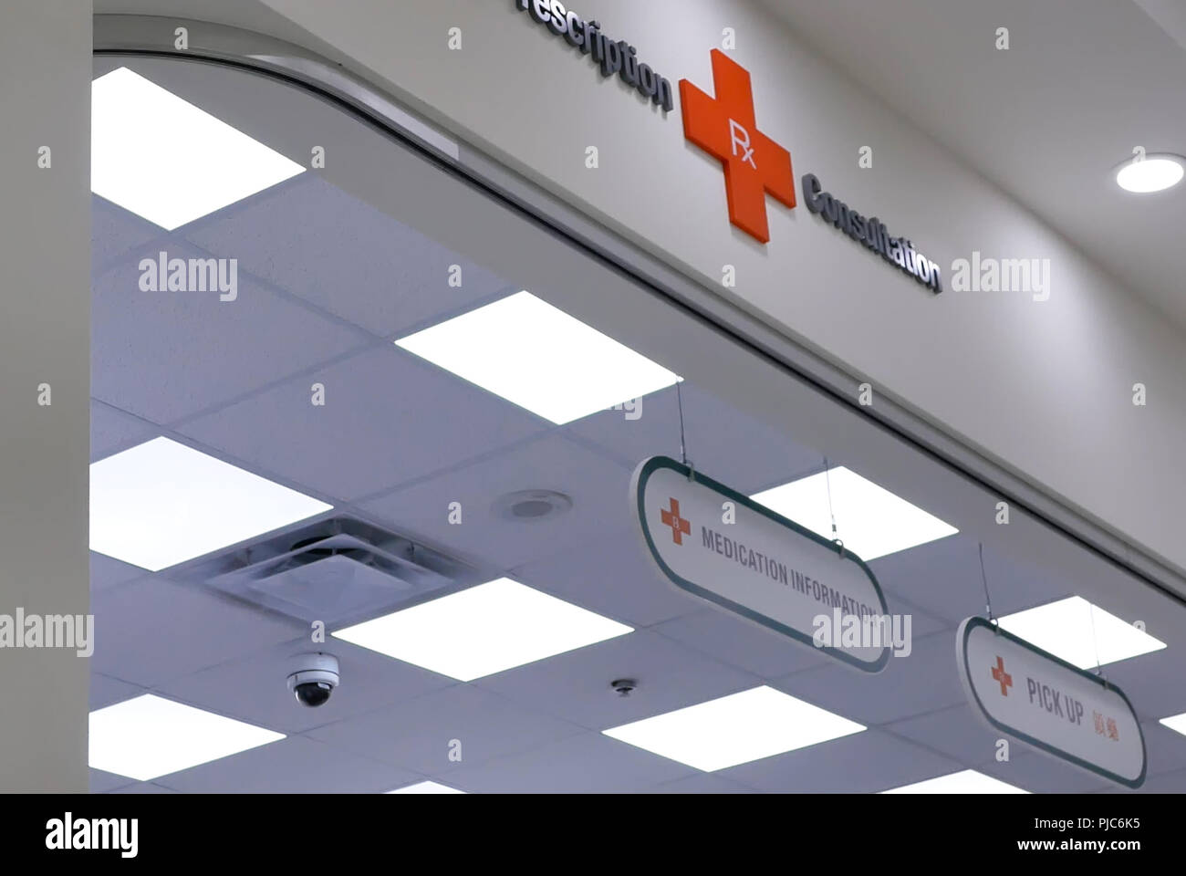 Close up of pick up and medication information sign hanging on store ...