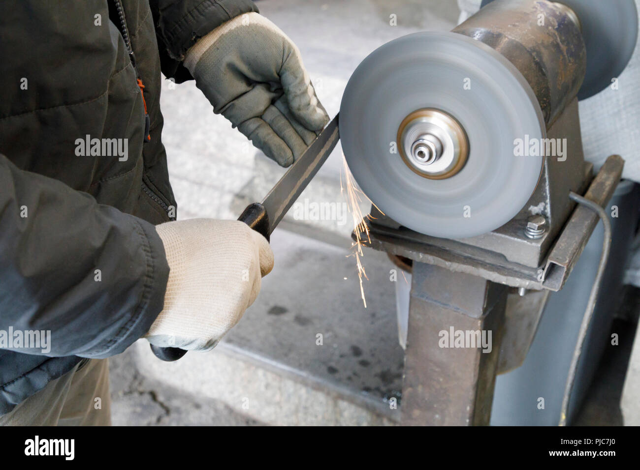 Islamic Republic of Iran. Tehran Bazaar. Household knife sharpening ...