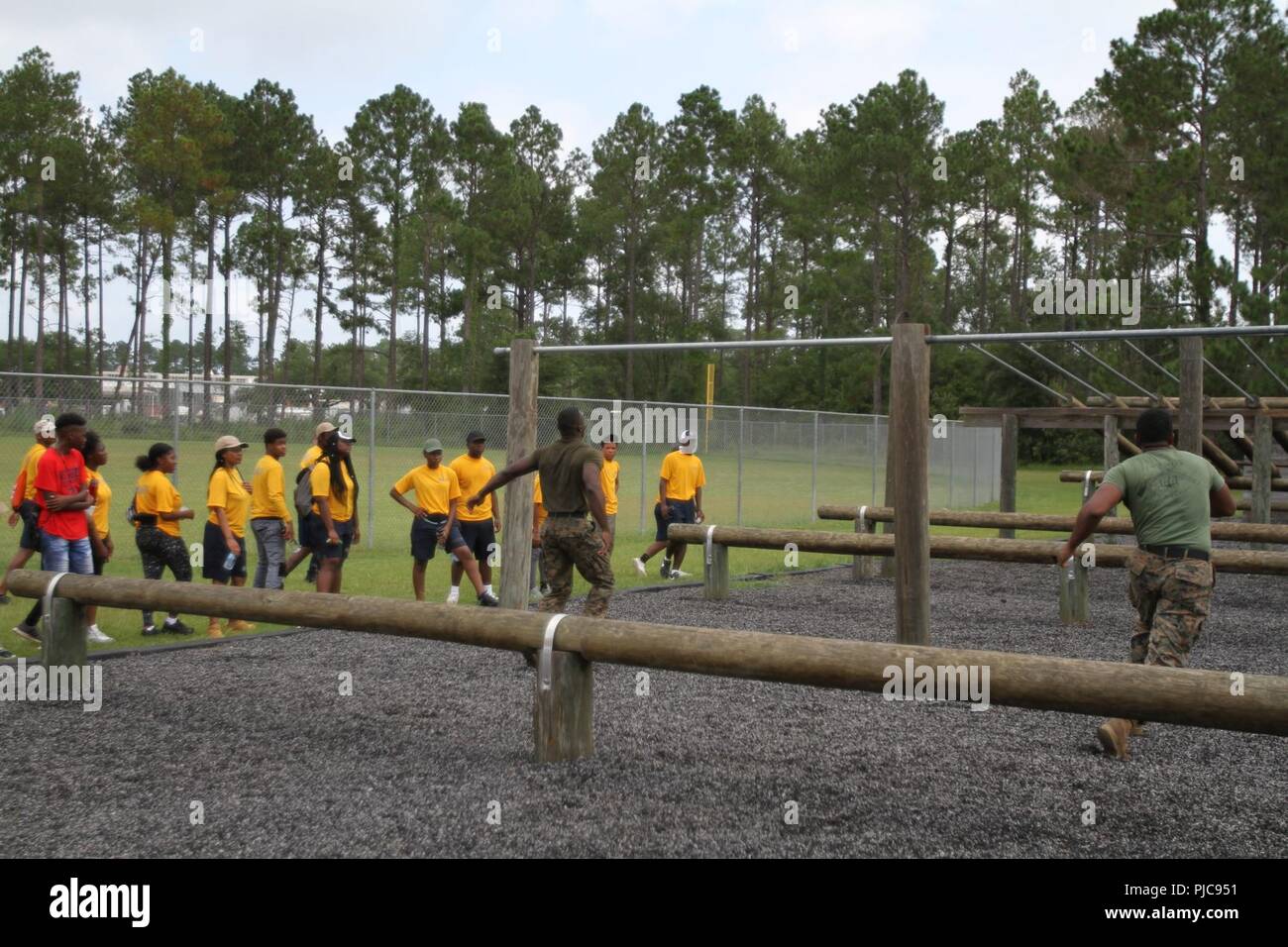 U. S. Marine Corps instructors perform a demonstration of proper ...