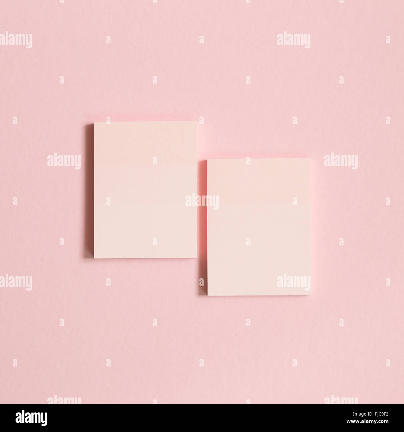 Pink memo pad, sticky notes on pink background Stock Photo - Alamy