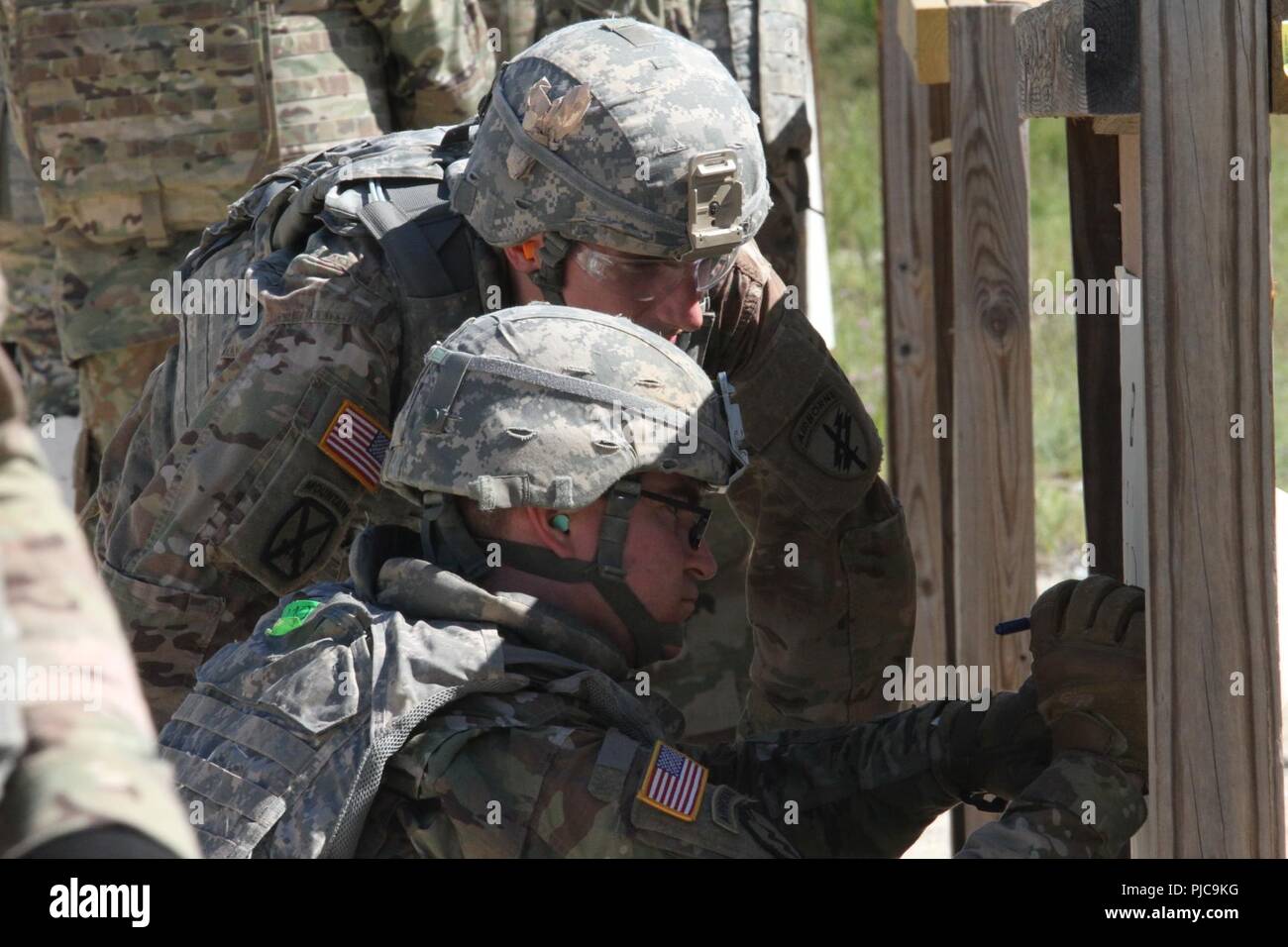 U.S. Army Reserve Soldiers mark shot group on their targets after ...