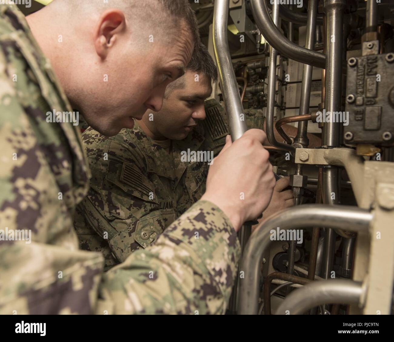 Lt. Nicholas Swanda, forward, and Machinist’s Mate (Non-Nuclear ...