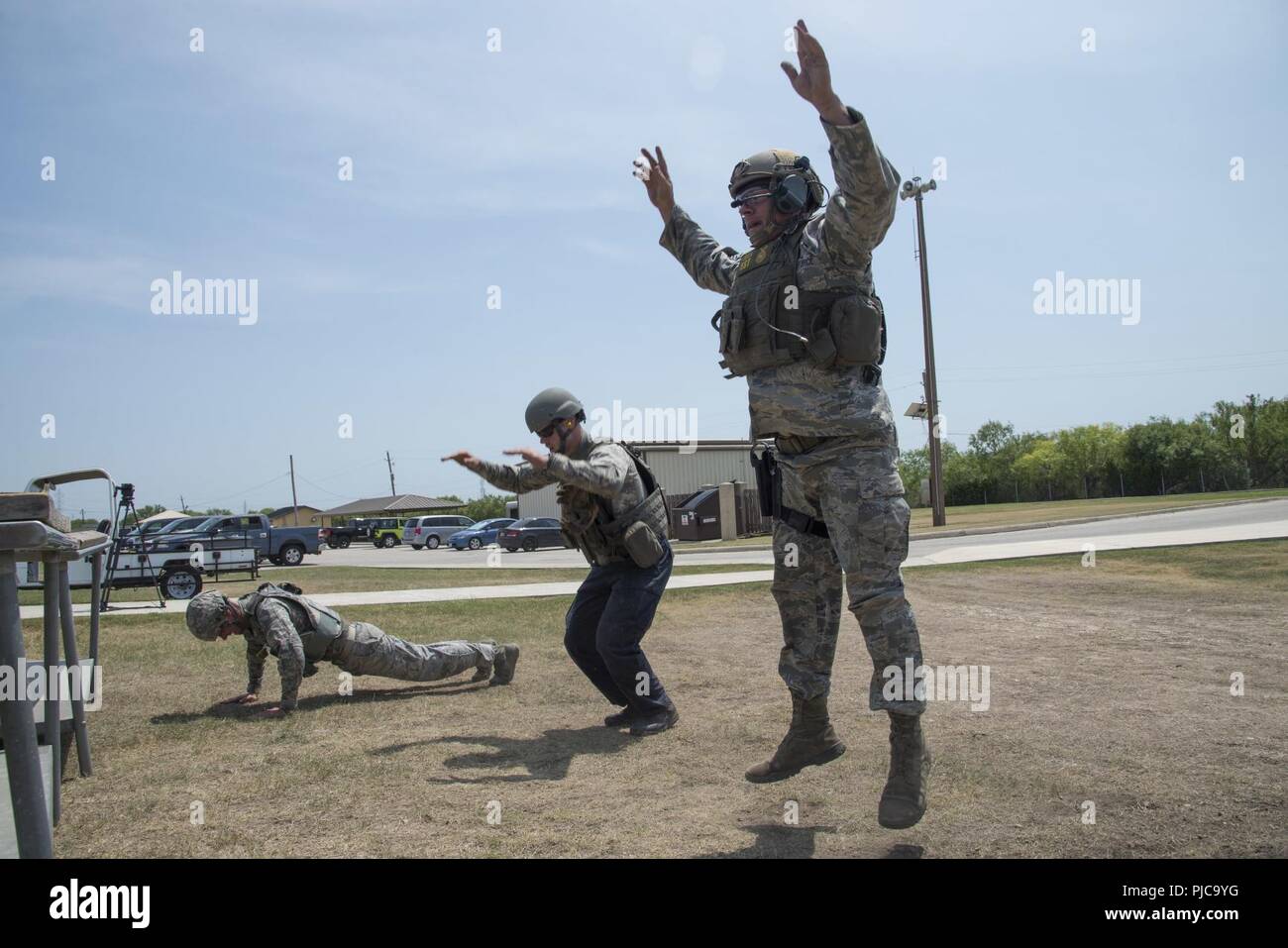 U.S. Air Force Security Forces members perform stress drill exercises ...