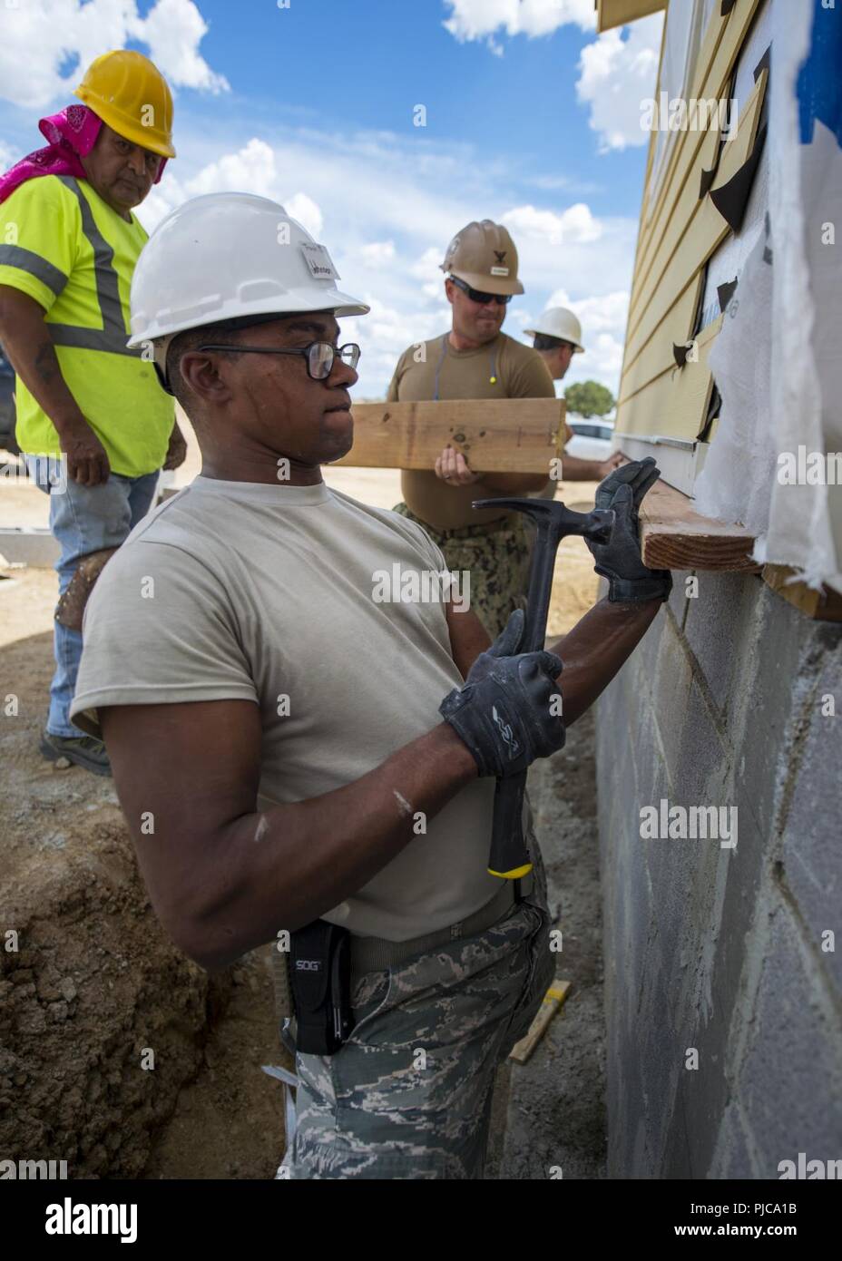 U.S. Air Force Staff Sgt. Robert Johnson, an electrician from the 133rd ...