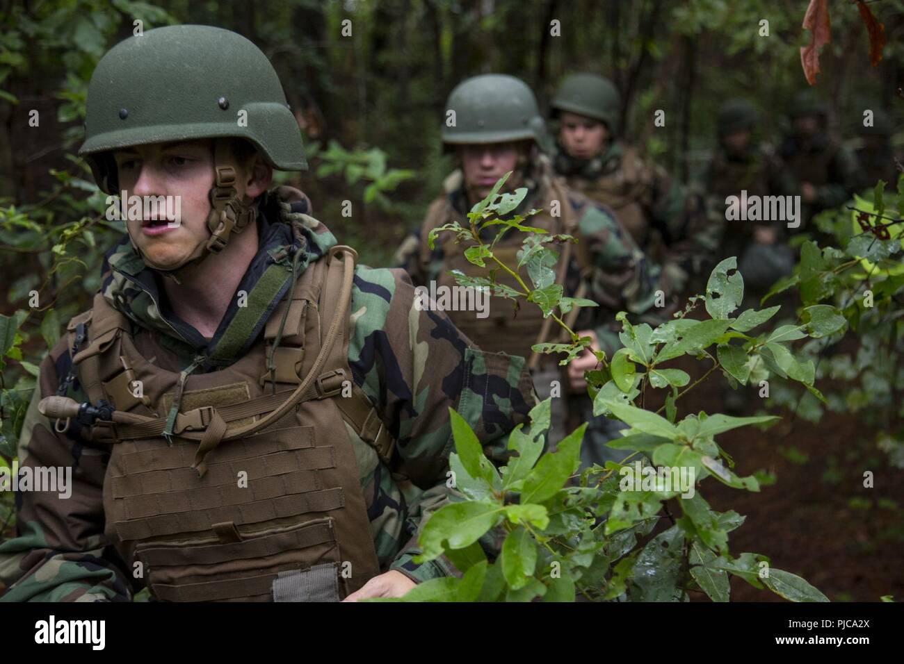 Naval Reserve Officer Training Corps Midshipman manuever through the ...