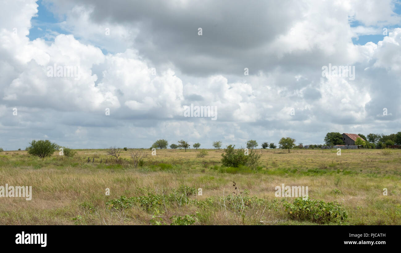 View of Large Farm Land with Rusted Barn on the Side Stock Photo - Alamy