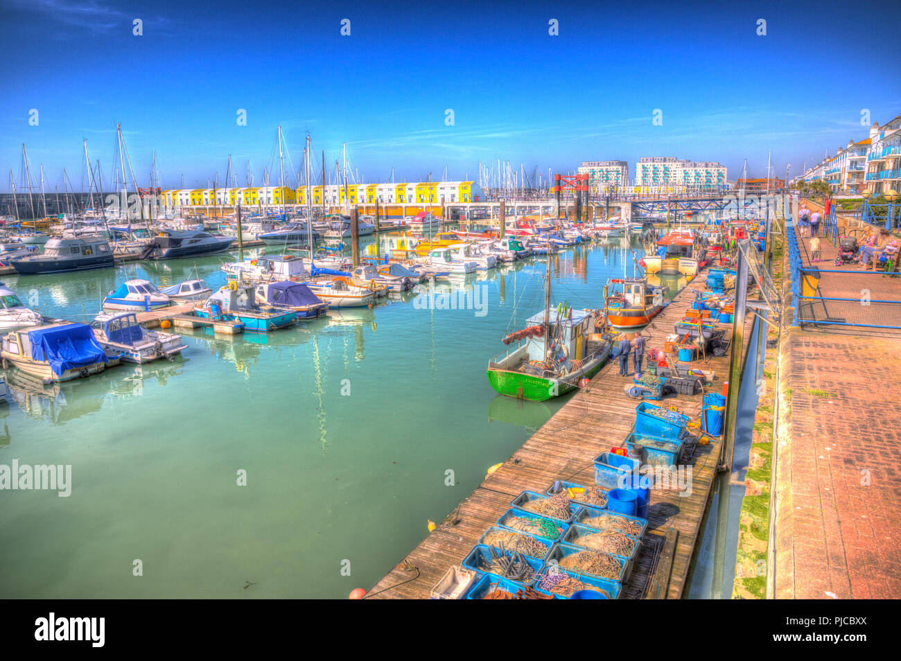 Brighton harbour marina with boats and yachts East Sussex England UK ...