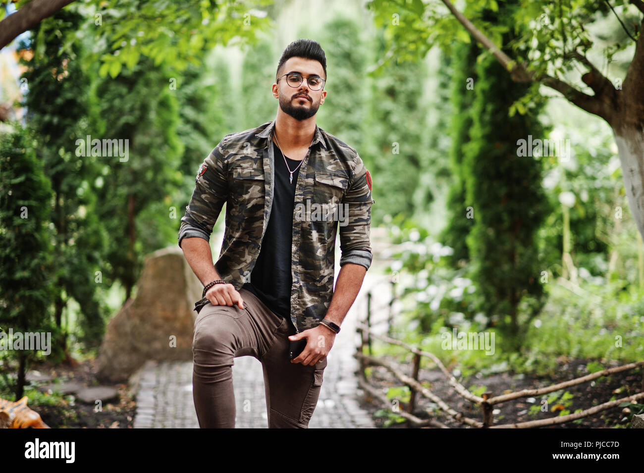 Awesome beautiful tall ararbian beard macho man in glasses and military ...