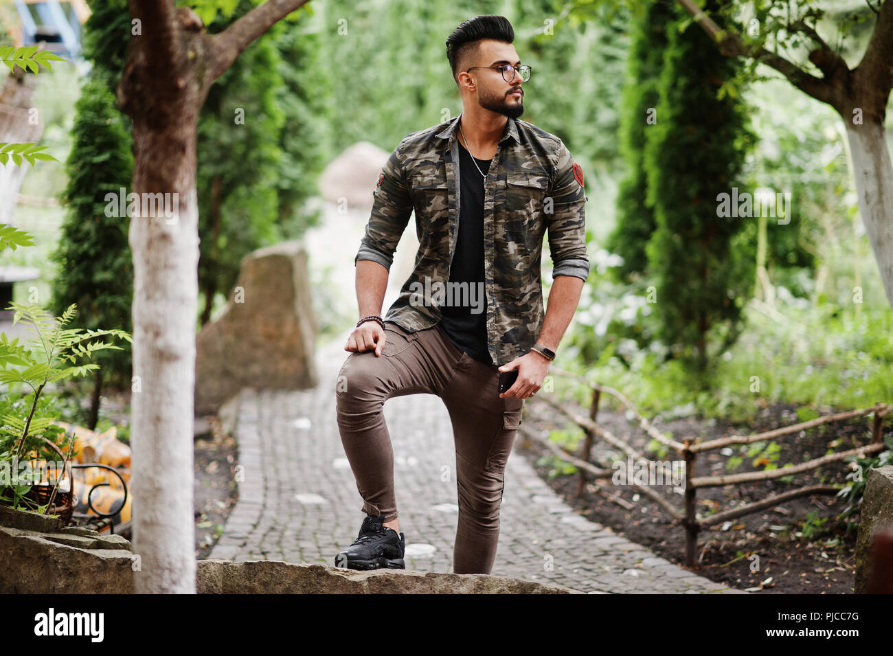 Awesome beautiful tall ararbian beard macho man in glasses and military ...