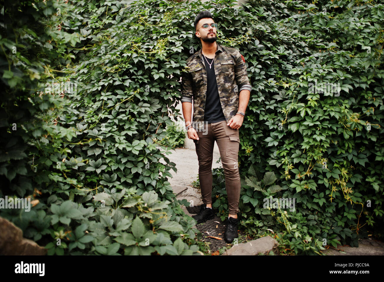 Awesome beautiful tall ararbian beard macho man in glasses and military ...