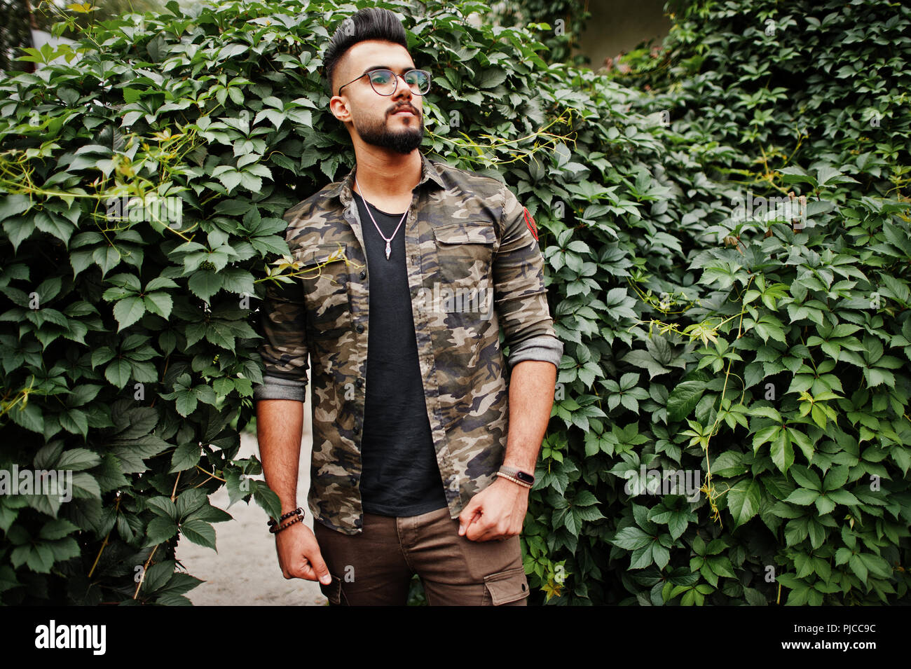 Awesome beautiful tall ararbian beard macho man in glasses and military ...