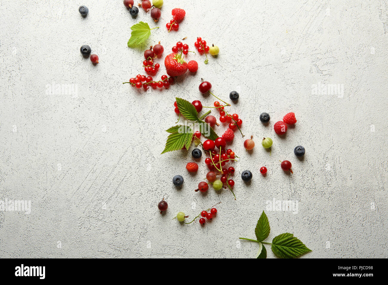 Fresh berries mix on white background Stock Photo - Alamy