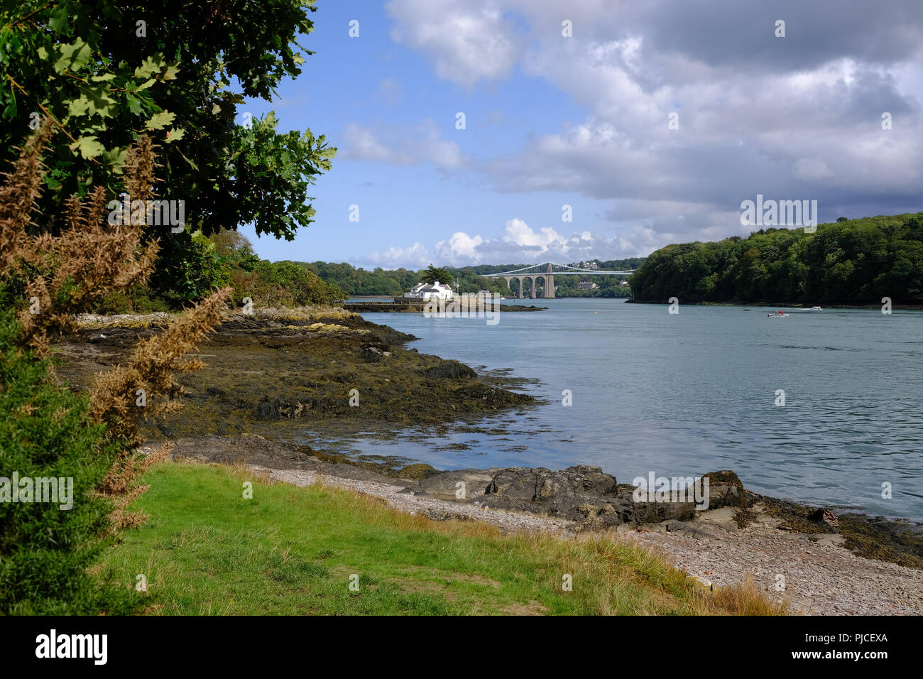Menai Straits with Menai Bridge in distance Stock Photo - Alamy