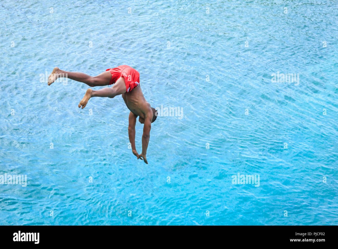 Boy jumps water hi-res stock photography and images - Alamy