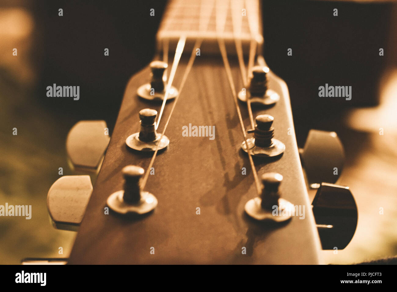 Close up of an new acoustic guitar head Stock Photo - Alamy
