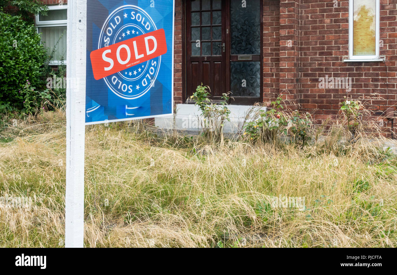 Sold sign outside bungalow in north east England. UK Stock Photo - Alamy