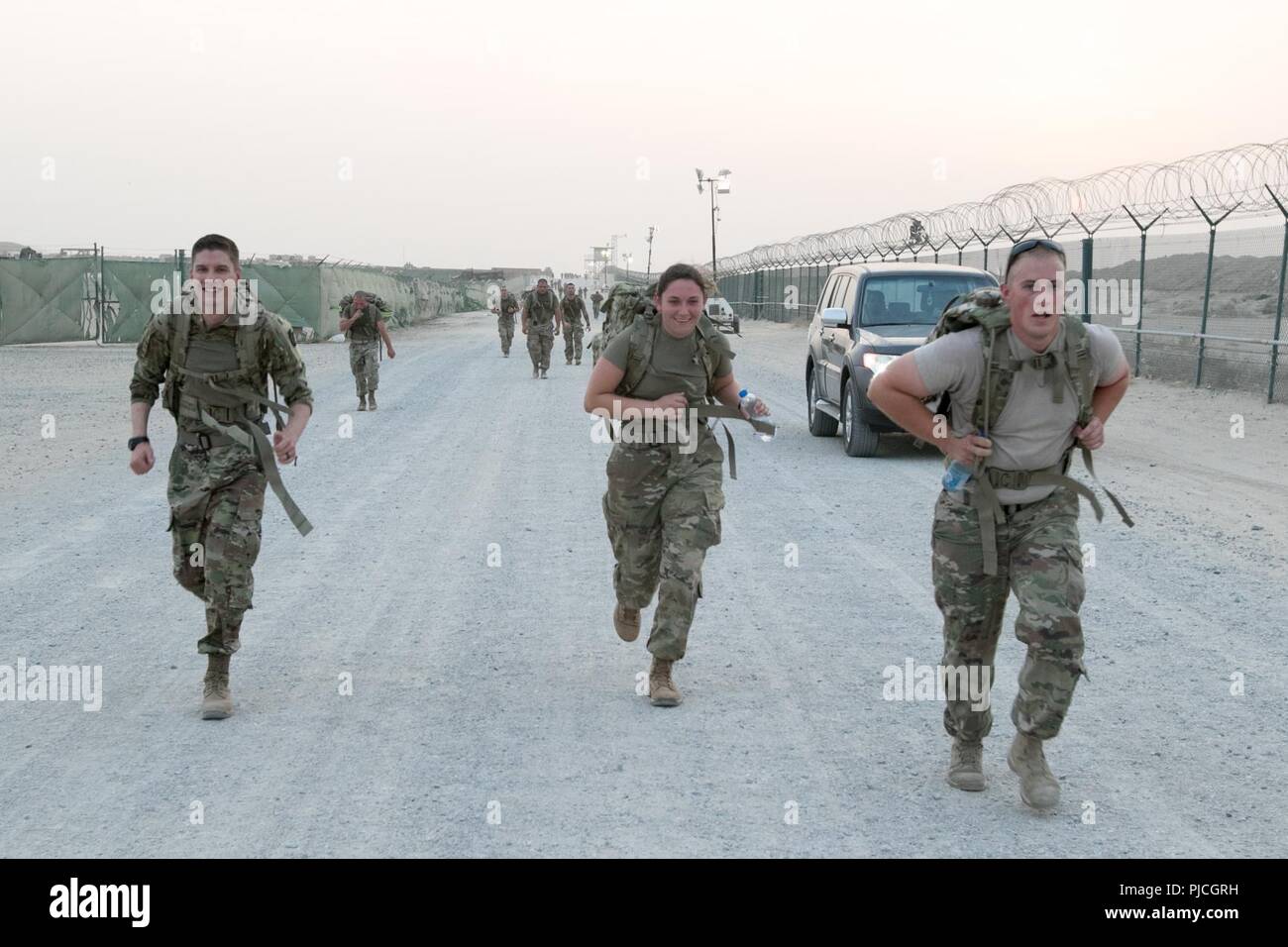 CAMP ARIFJAN, Kuwait – 1st Lt. Colin Myers, Spc. Erin Murphy and Spc ...