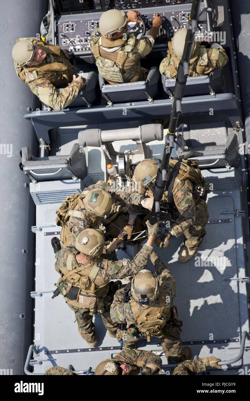 Marines with the Maritime Raid Force, 22nd Marine Expeditionary Unit ...