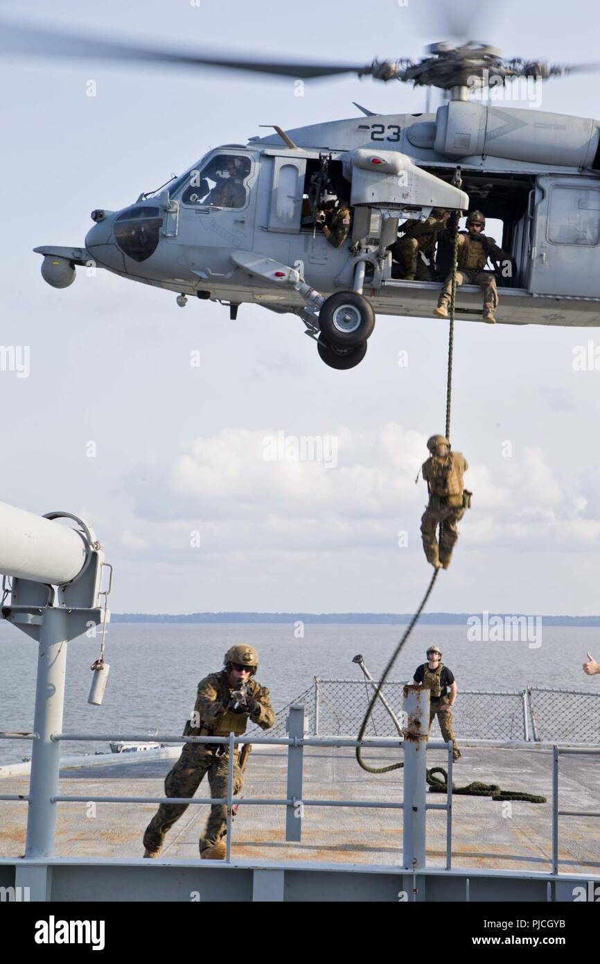 U.S. Marines with the Maritime Raid Force, 22nd Marine Expeditionary ...