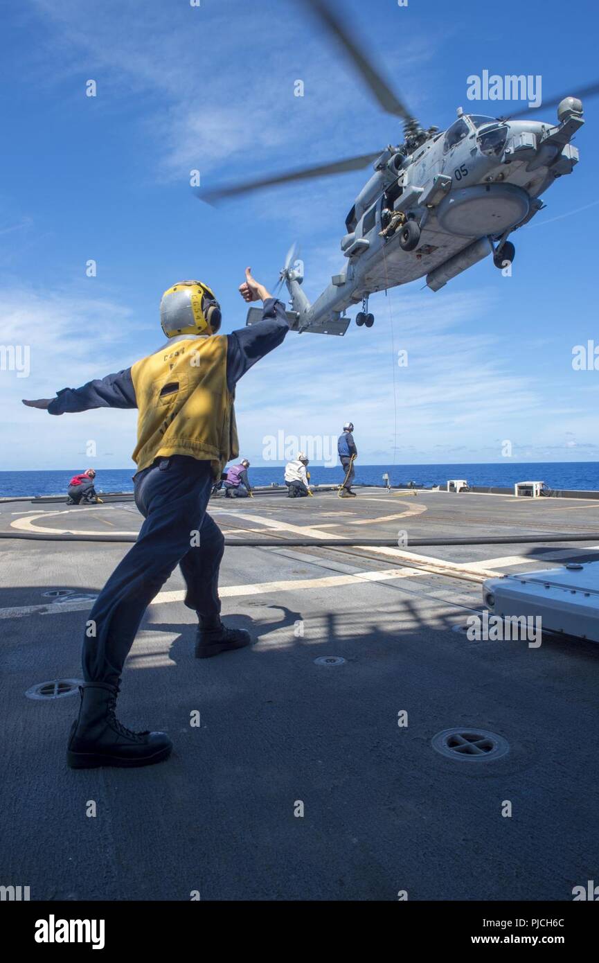 PHILIPPINE SEA (July 21, 2018) Boatswain’s Mate 3rd Class Aaron Mason ...