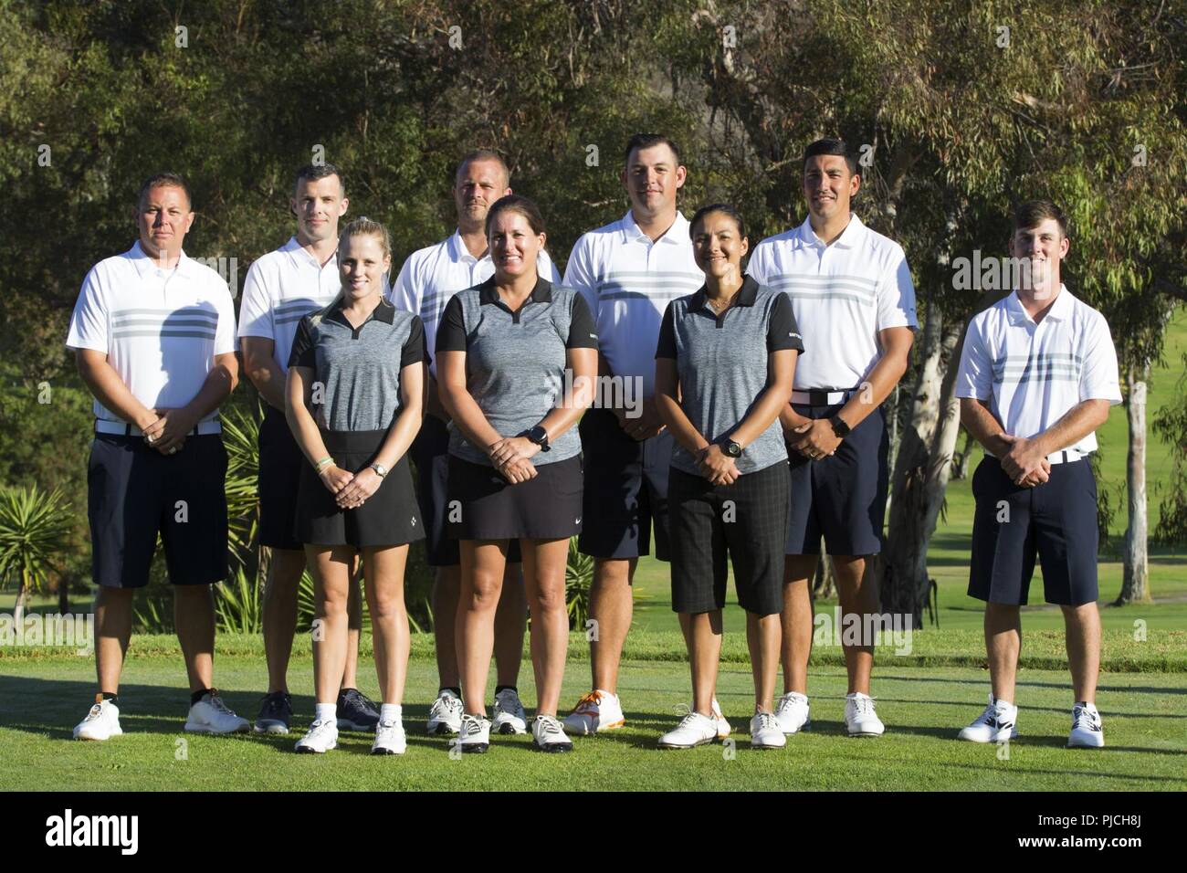 Members of the U.S. Navy’s golf team pose for a group photo during the ...