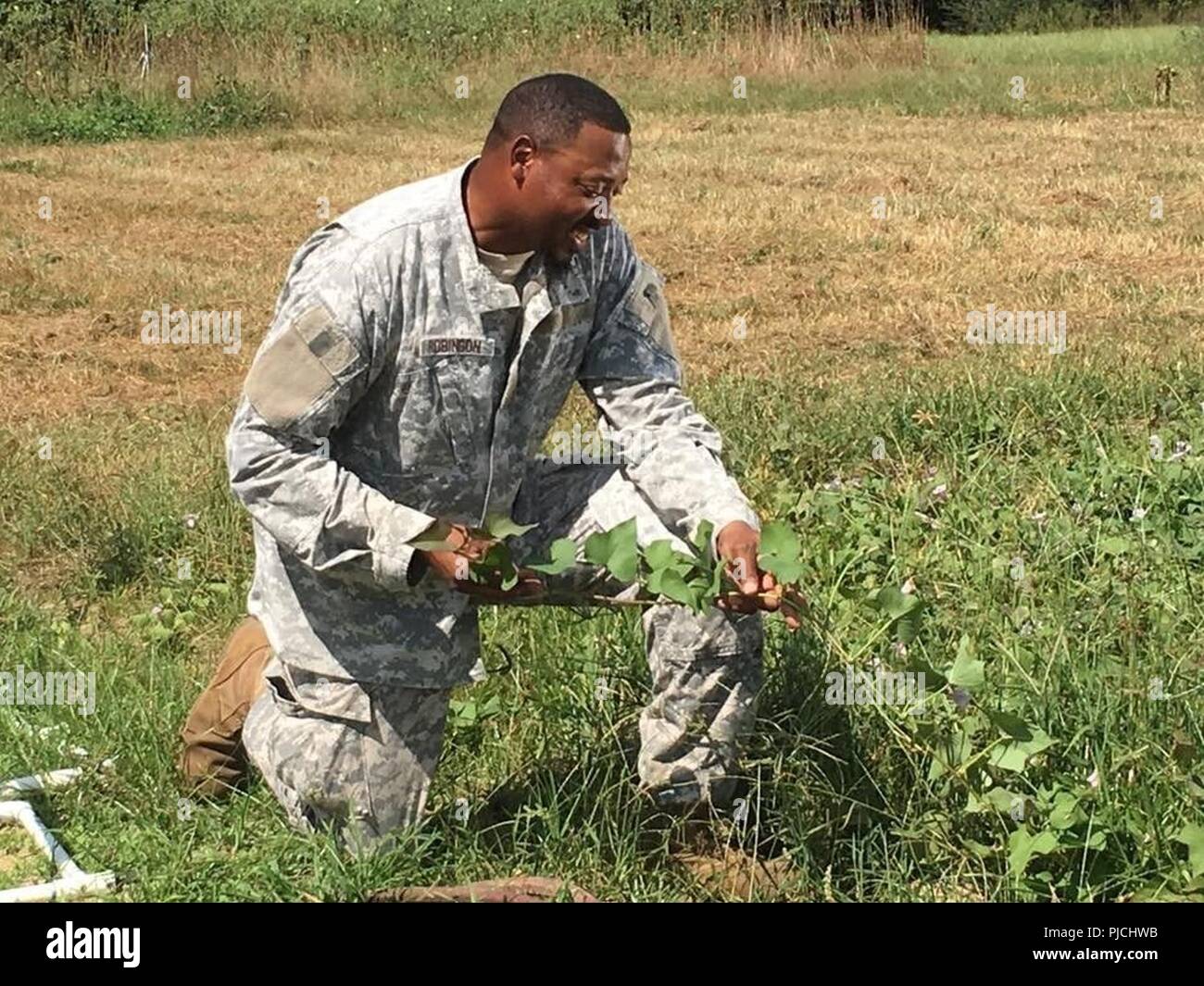 U.S. Army veteran Tim Robinson, a farmer in South Georgia, checks on ...