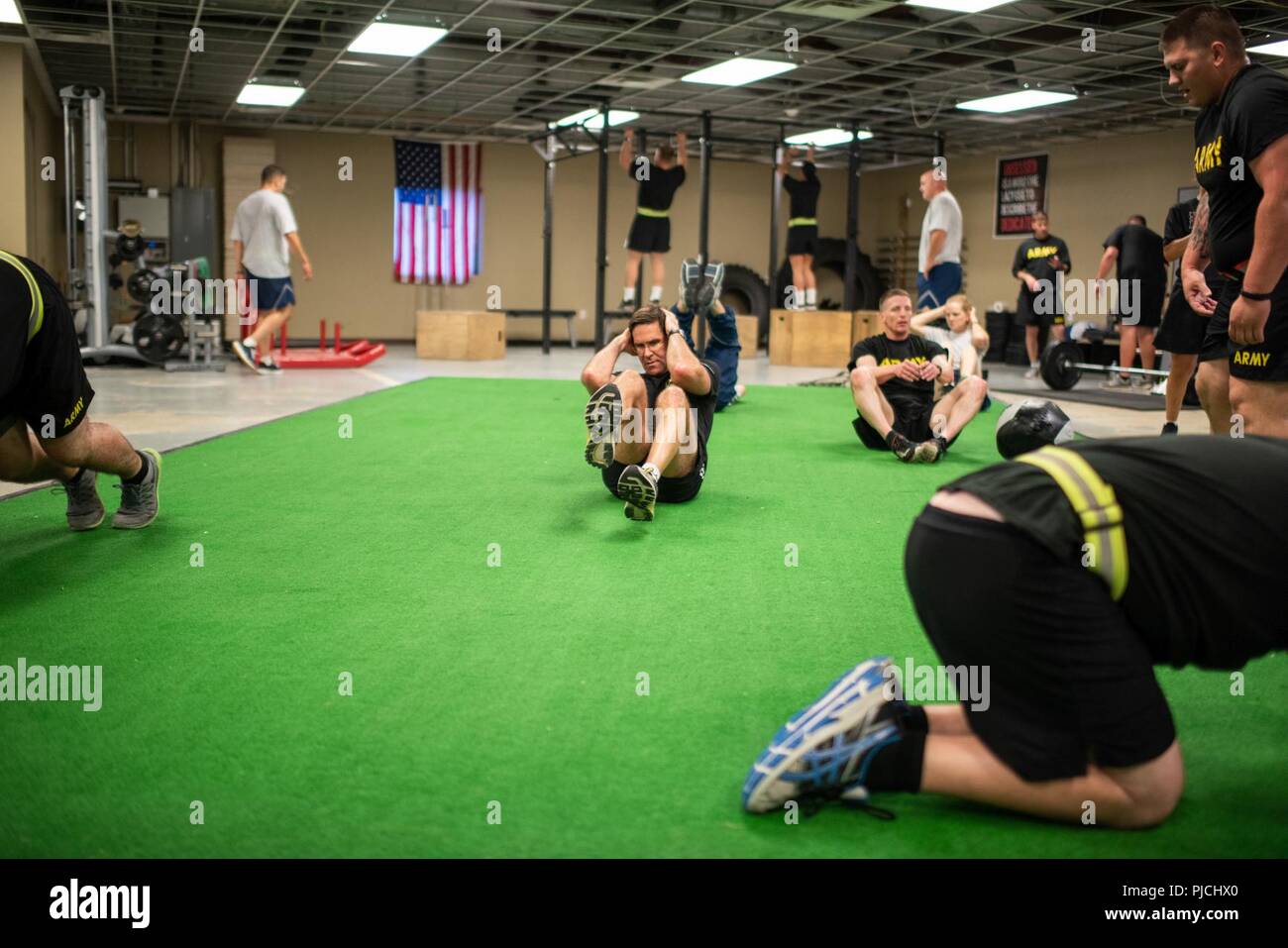 Secretary of the Army Dr. Mark T. Esper conducts circuit training with ...