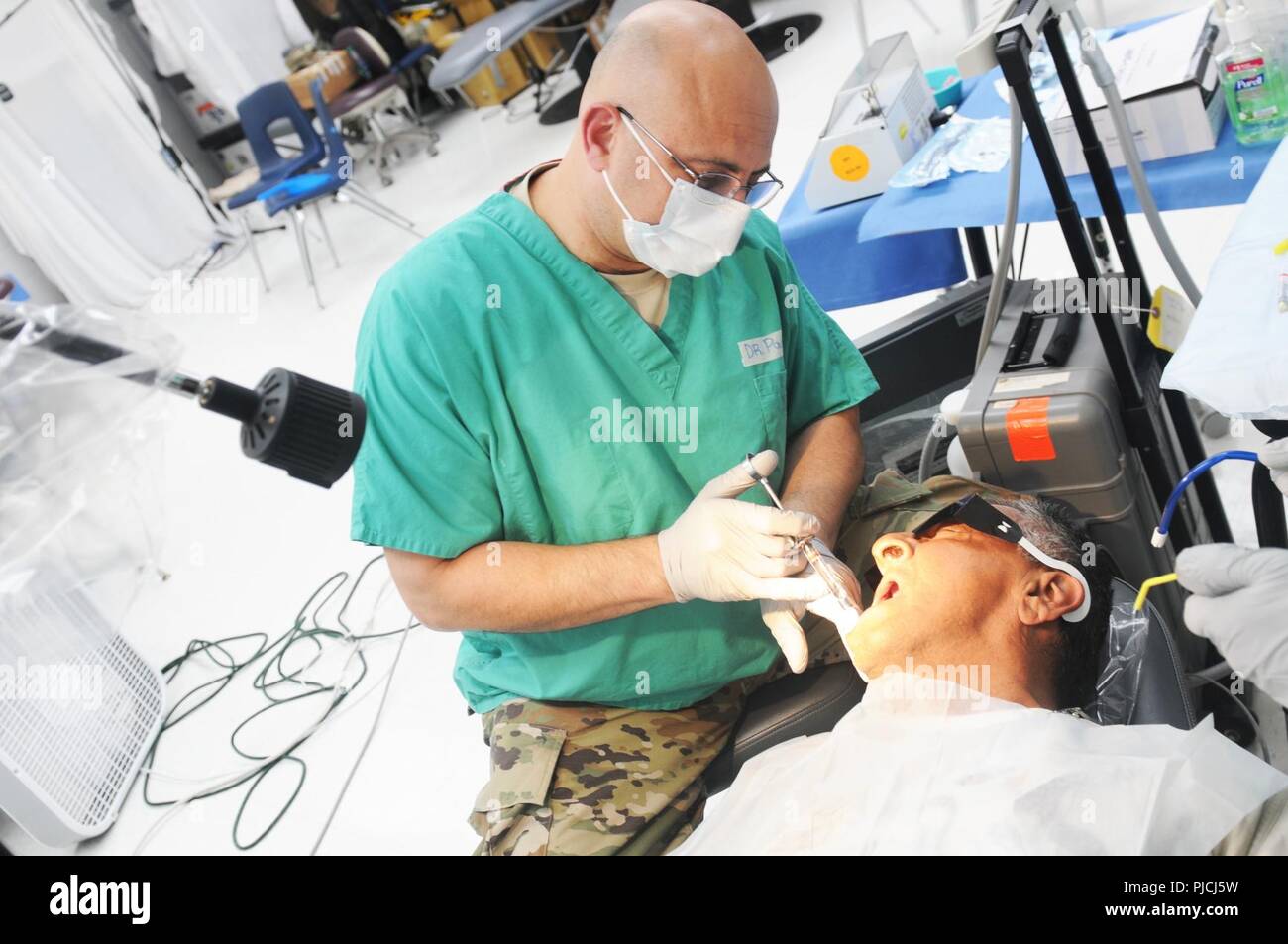 Smith, a Vietnam-era veteran and Chippewa Native American, receives a ...