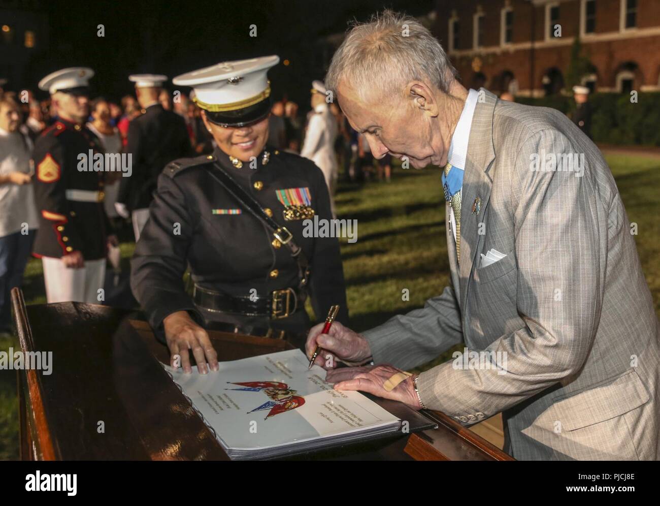 Major Gen James E Livingston Medal Of Honor Recipient Signs The
