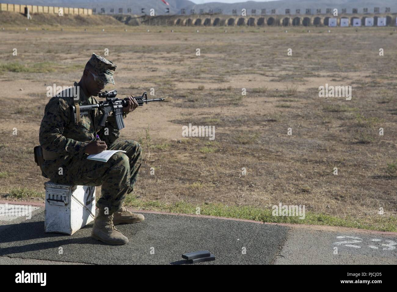 U.S. Marine Corps Sgt. Lorenzo Jackson, student, Combat Marksmanship ...