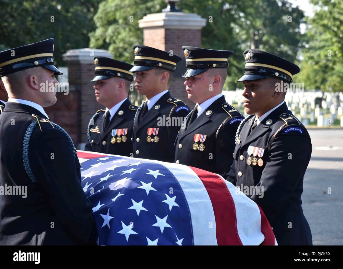 Soldiers with the 3rd Infantry Regiment (The Old Guard) carry the ...