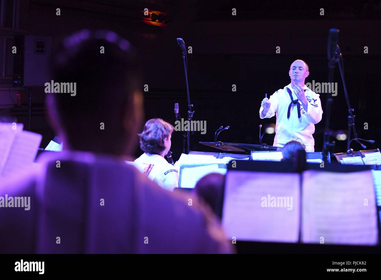 Directs the band hi-res stock photography and images - Alamy