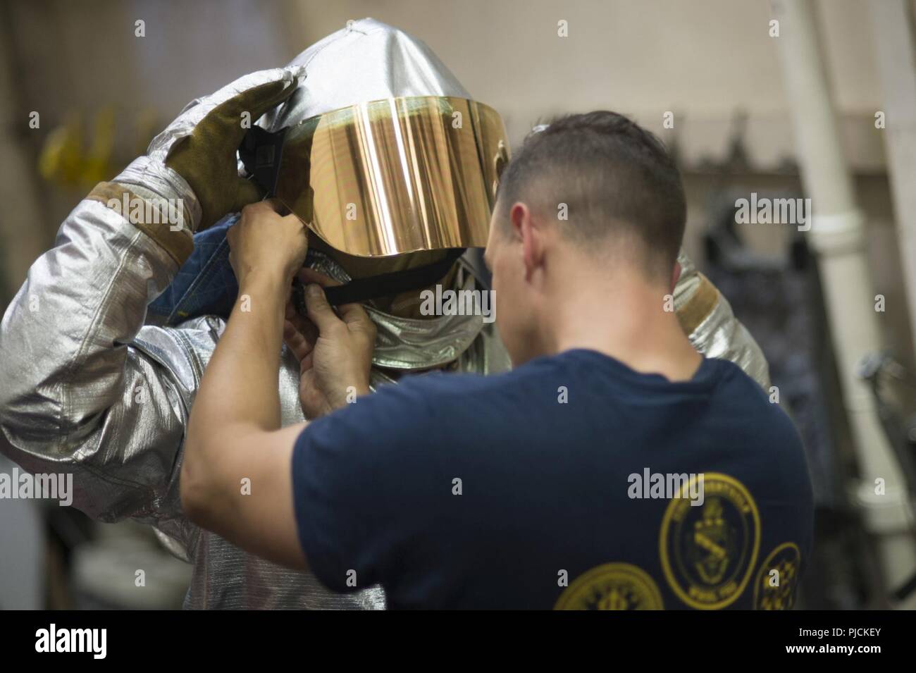 PACIFIC OCEAN (July 22, 2018) Petty Officer 3rd Class Nicholas Basso is ...